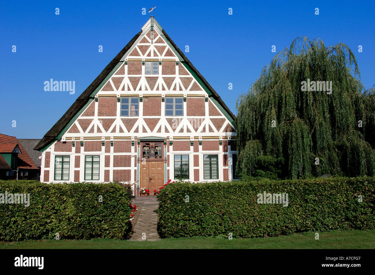 Reed roofed house Ladekop Stock Photo - Alamy