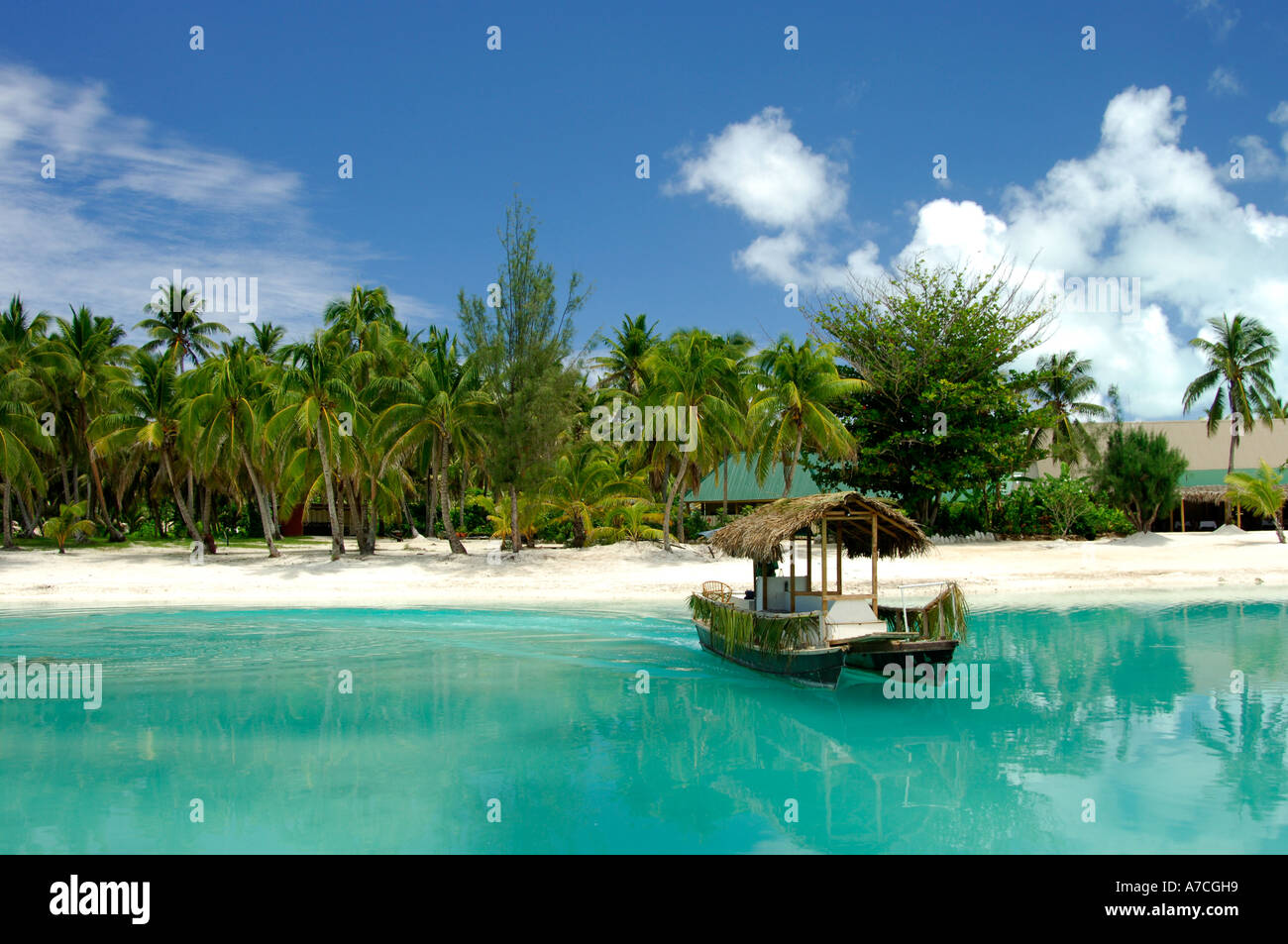 A small ferry at the Aitutaki Lagoon in the Cook Islands Stock Photo ...