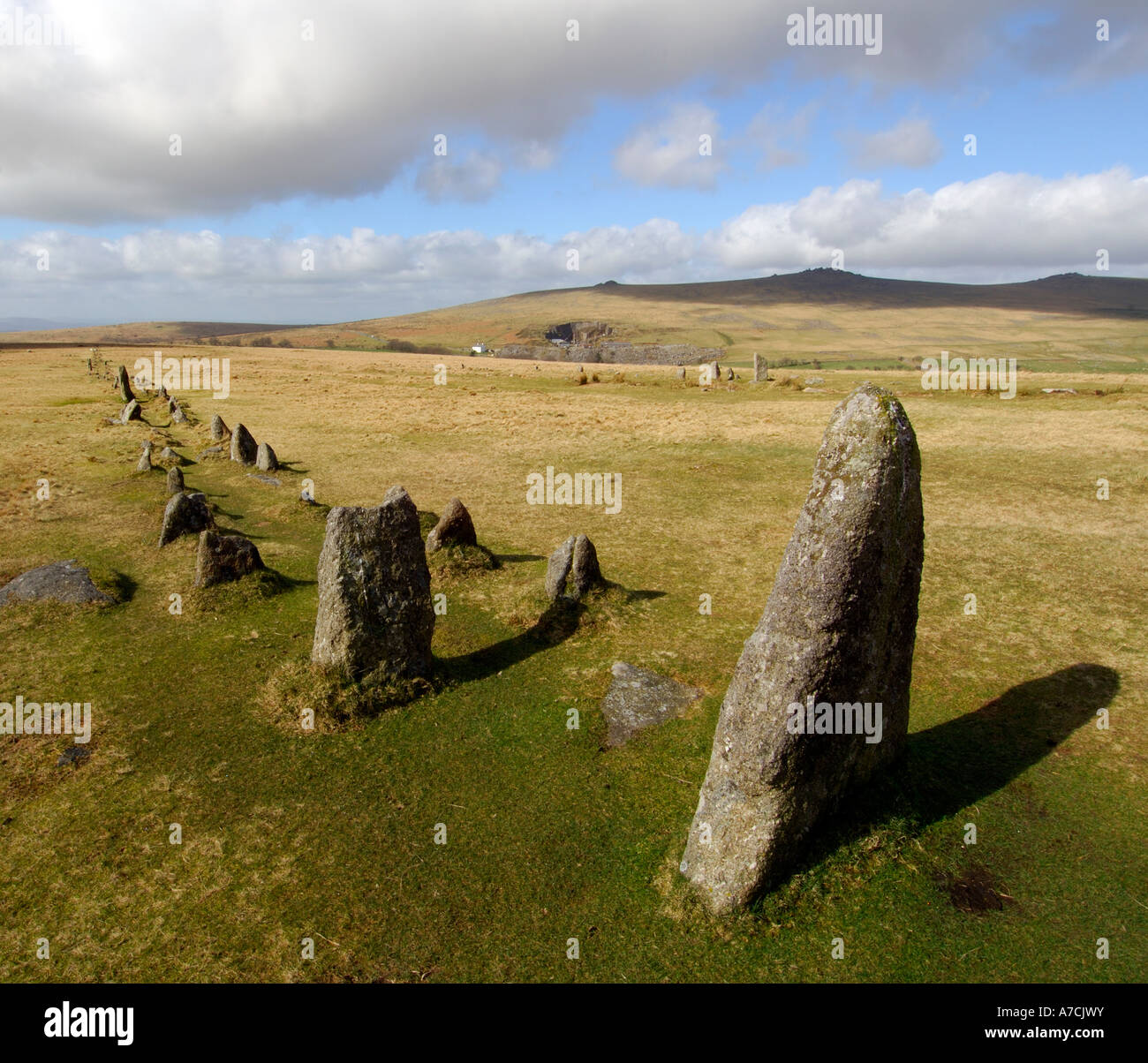 Ancient stone row at Merrivale on Dartmoor with bright sunshine and ...