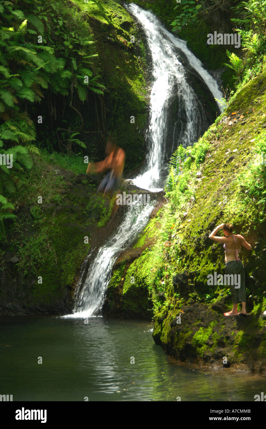Cooling off by Wigmore waterfall and plunge pool in Rarotonga in the ...