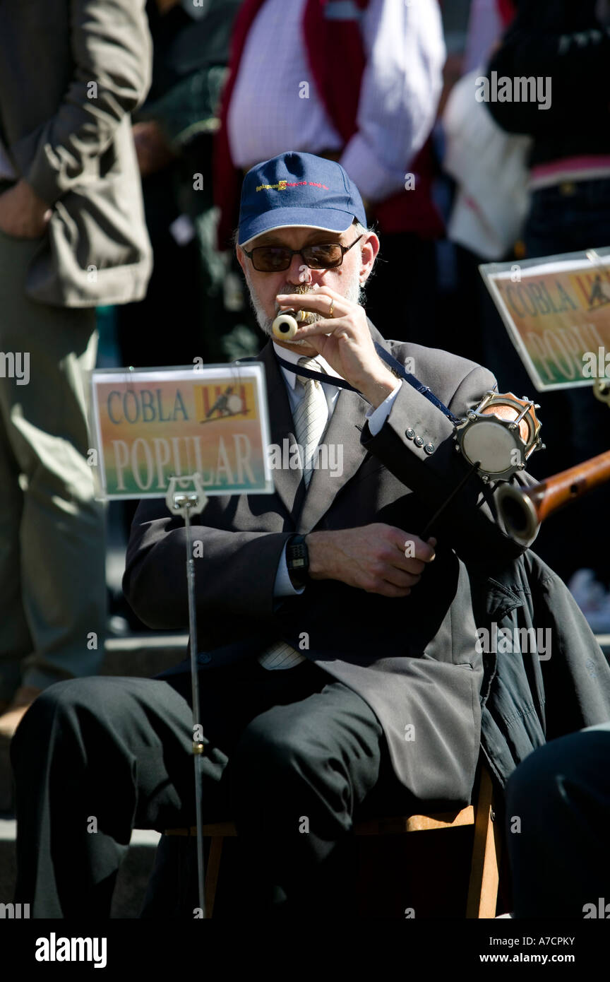 Man playing the flabiol (flute) and tambori (small drum) La Sardana ...