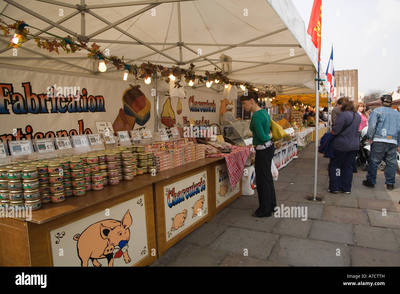 CHESTER CHESHIRE UK April A woman studies the selection of cooked meats ...