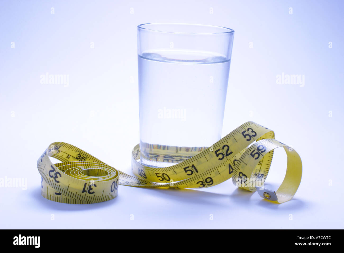 Tape Measure and Glass of Water Stock Photo - Alamy