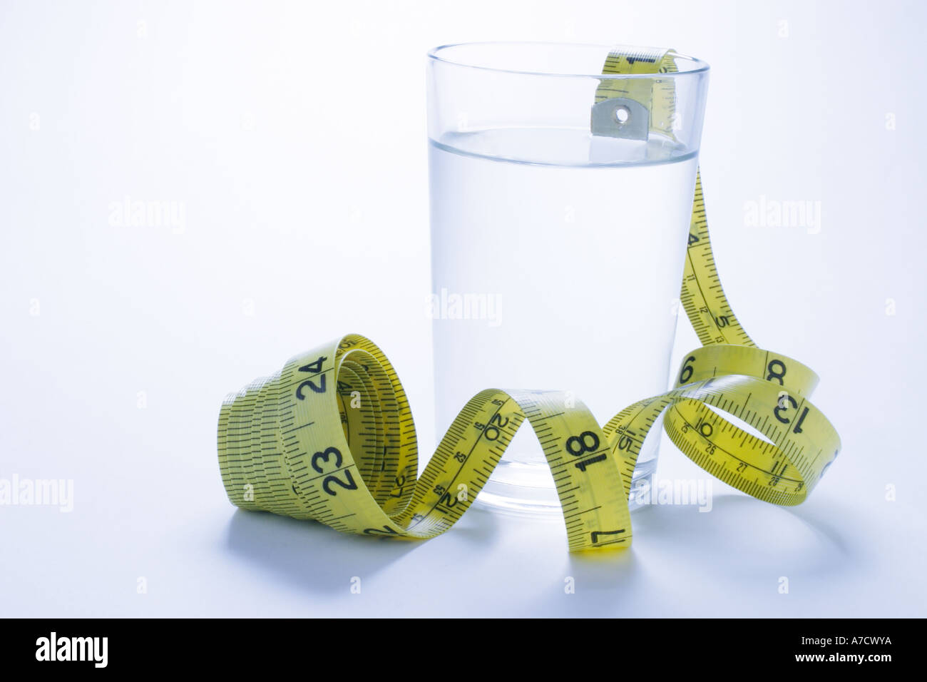 Tape Measure and Glass of Water Stock Photo - Alamy