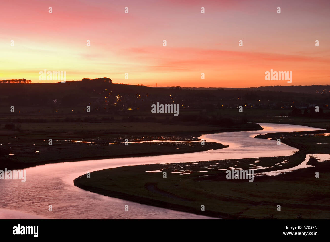 Evening sky and sunset reflected in the curves of the river Aln Stock ...