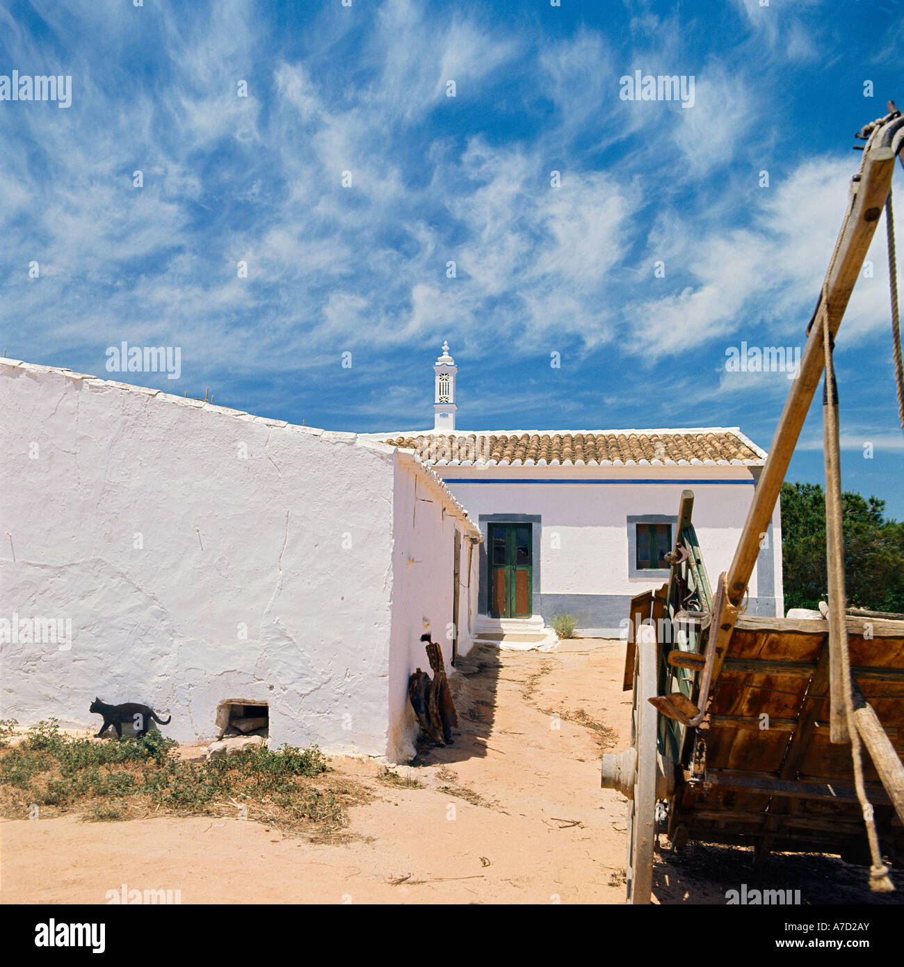 Rustic House & Cart Stock Photo - Alamy