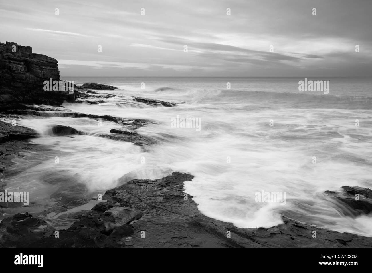 Waves fall on the rocks Stock Photo - Alamy
