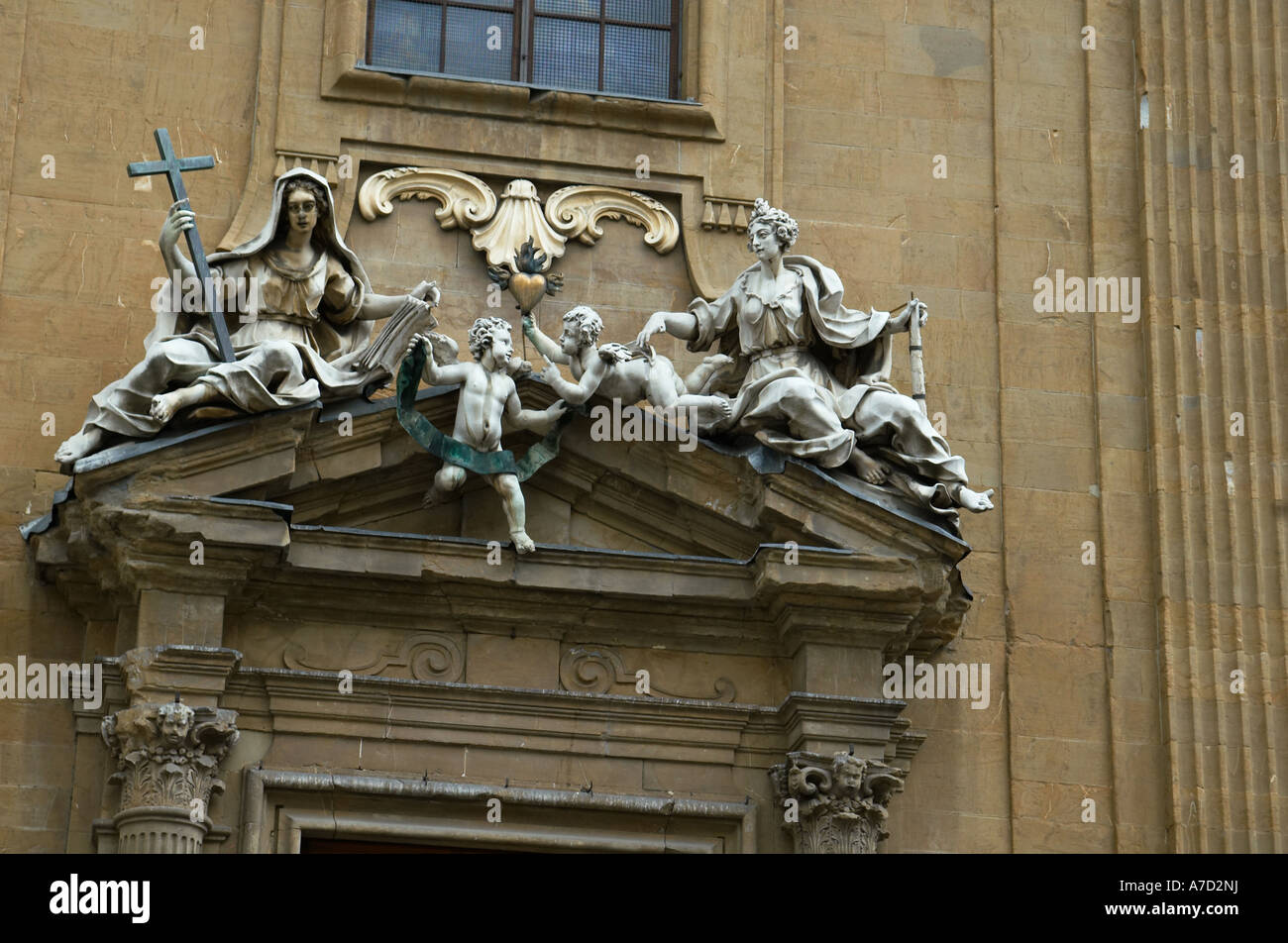Statues above doorway Florence Italy Stock Photo - Alamy
