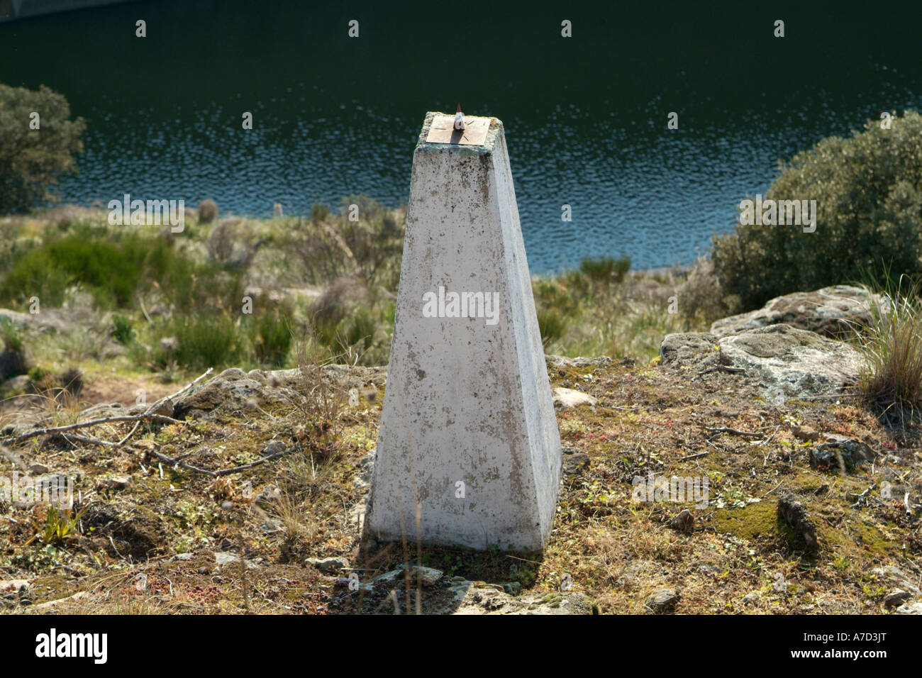 triangulation point used to survey a water barrage Stock Photo - Alamy
