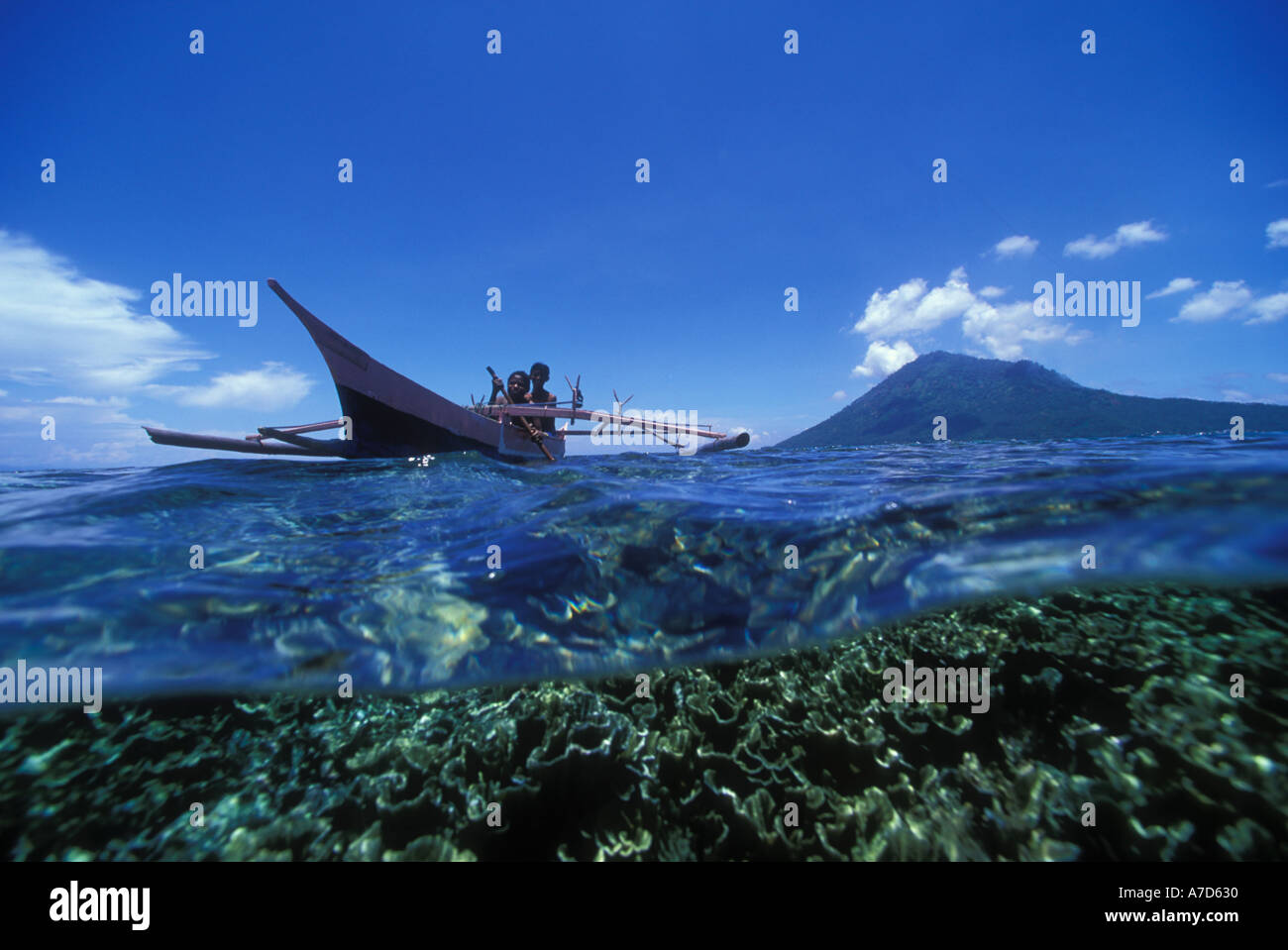 OVER UNDER VIEW OF A NATIVE FISHERMAN MANADO INDONESIA Stock Photo - Alamy