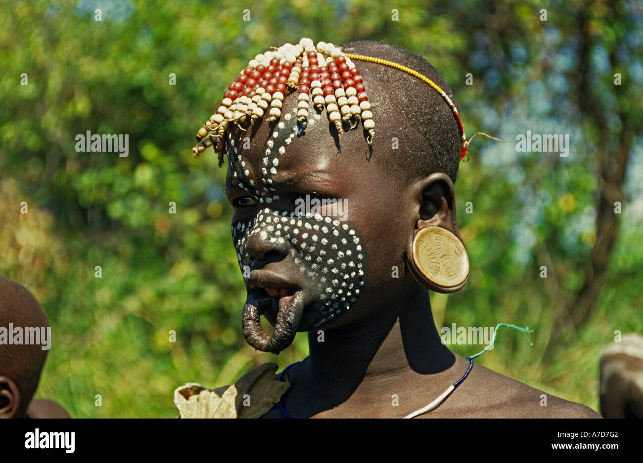 Mursi primitive people in Ethiopia Stock Photo - Alamy