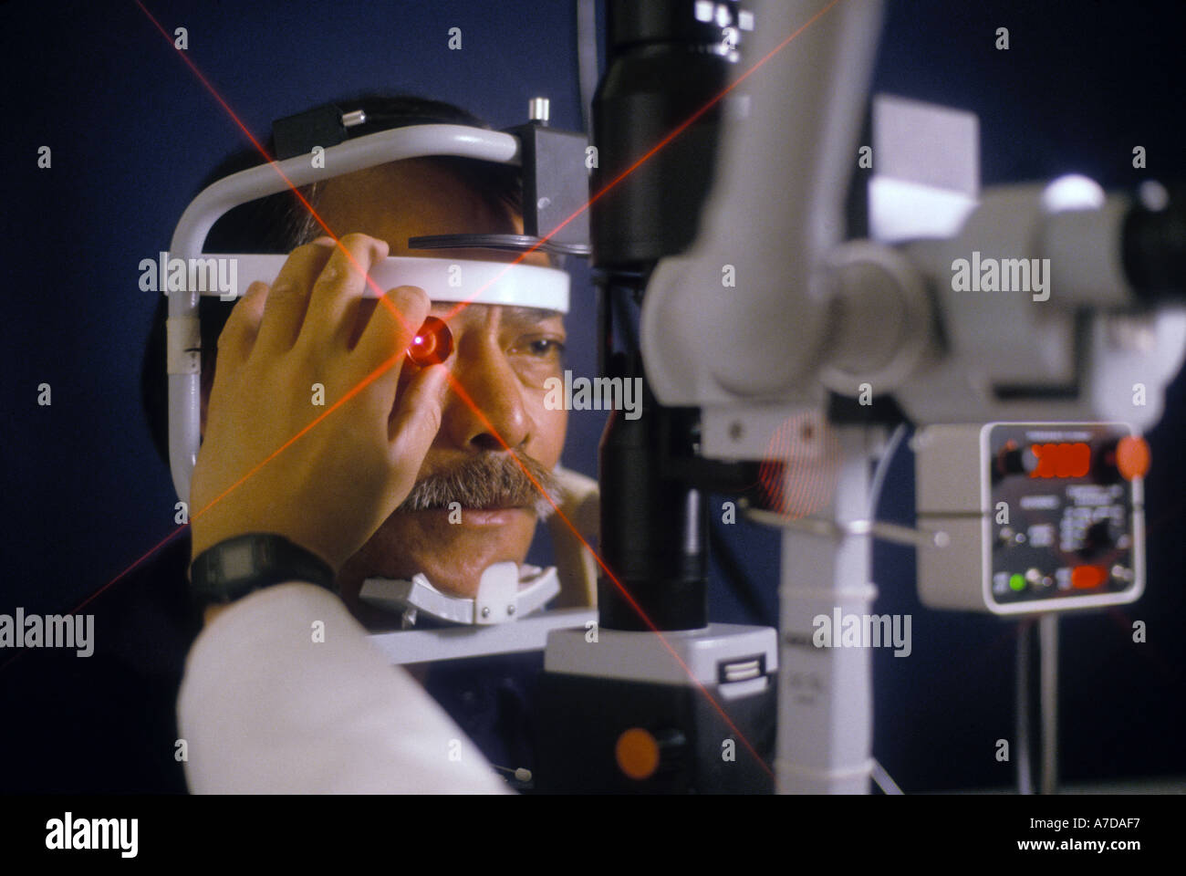 male patient undergoing eye exam Stock Photo - Alamy