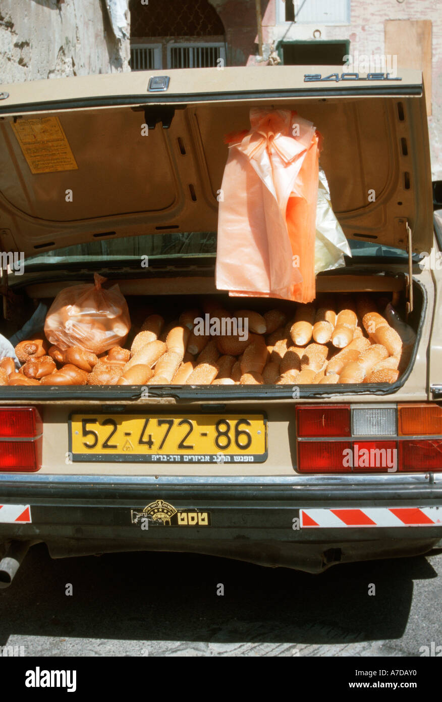 Bread for sale in the boot of a car in Israel Stock Photo - Alamy