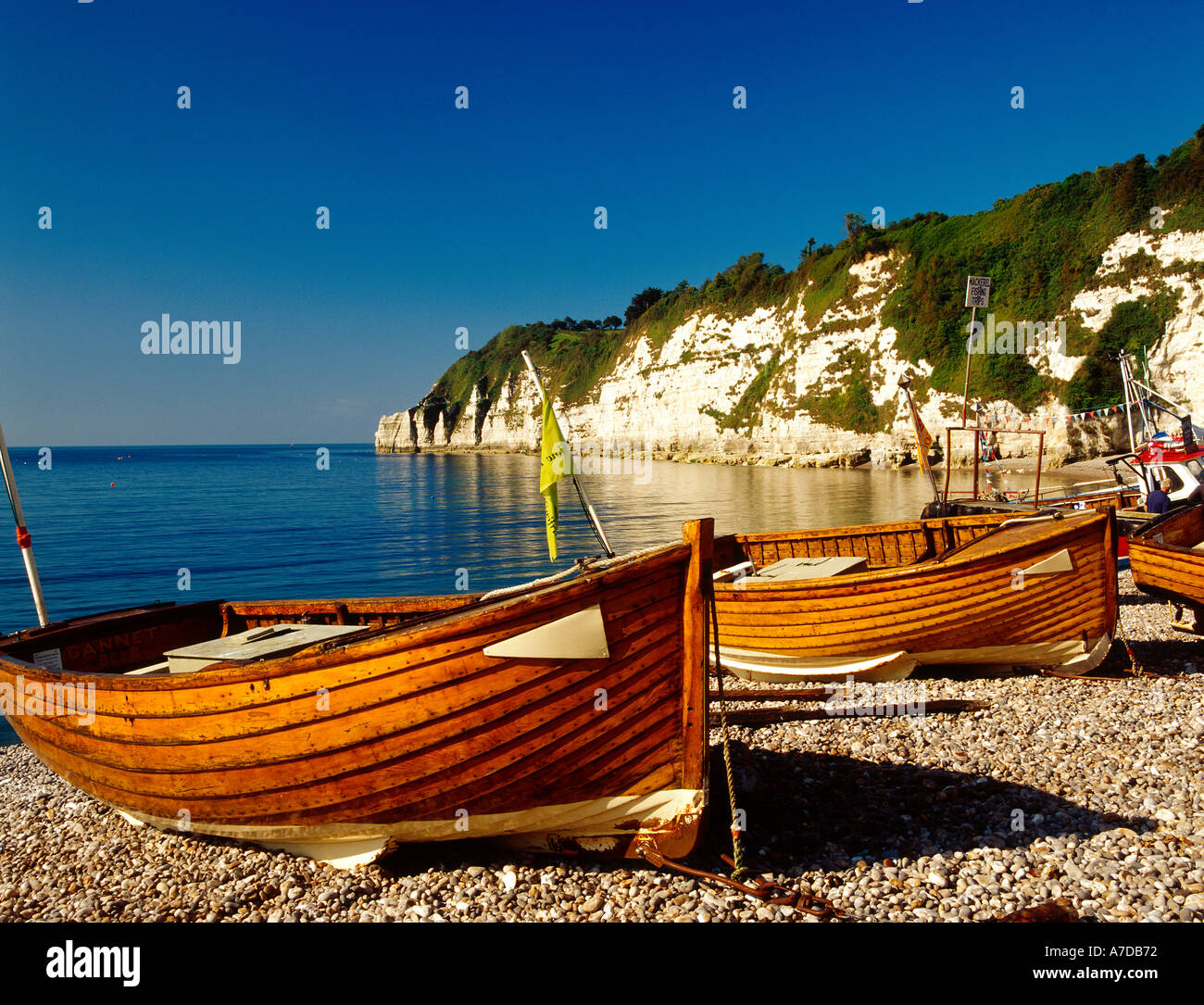 Boats on the Beach Beer Devon UK Stock Photo - Alamy
