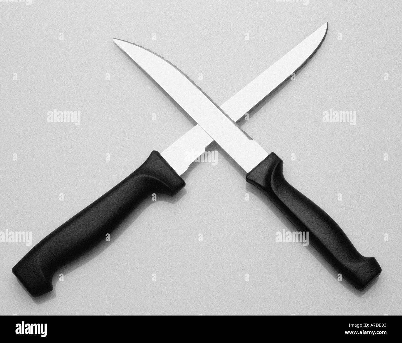 two kitchen knives crossed Stock Photo - Alamy