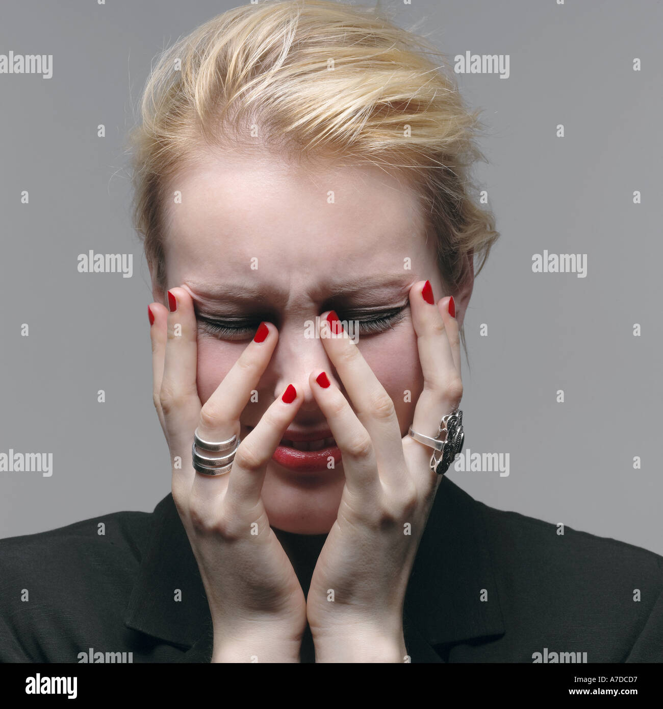 DEPRESSED FEMALE WITH HANDS OVER FACE Stock Photo - Alamy