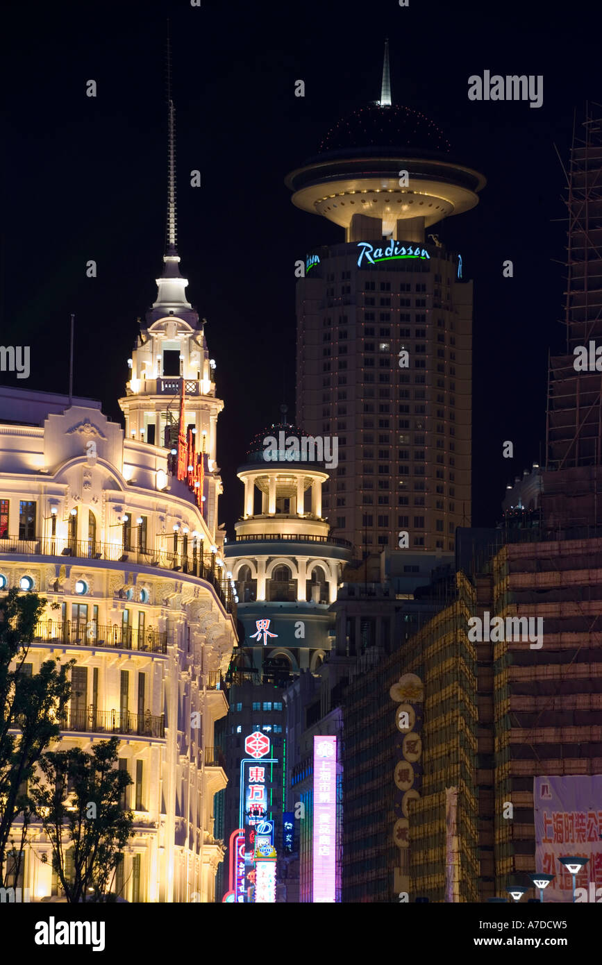 Asia China Shanghai The Radisson Hotel rises above neon lit shopping ...