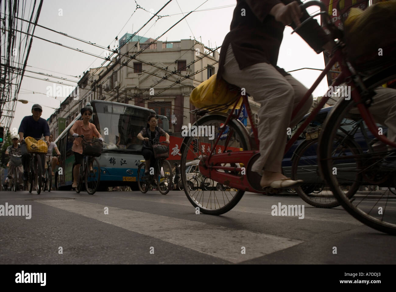 Asia China Shanghai Crowd of bicyclists and motor scooters fill streets ...