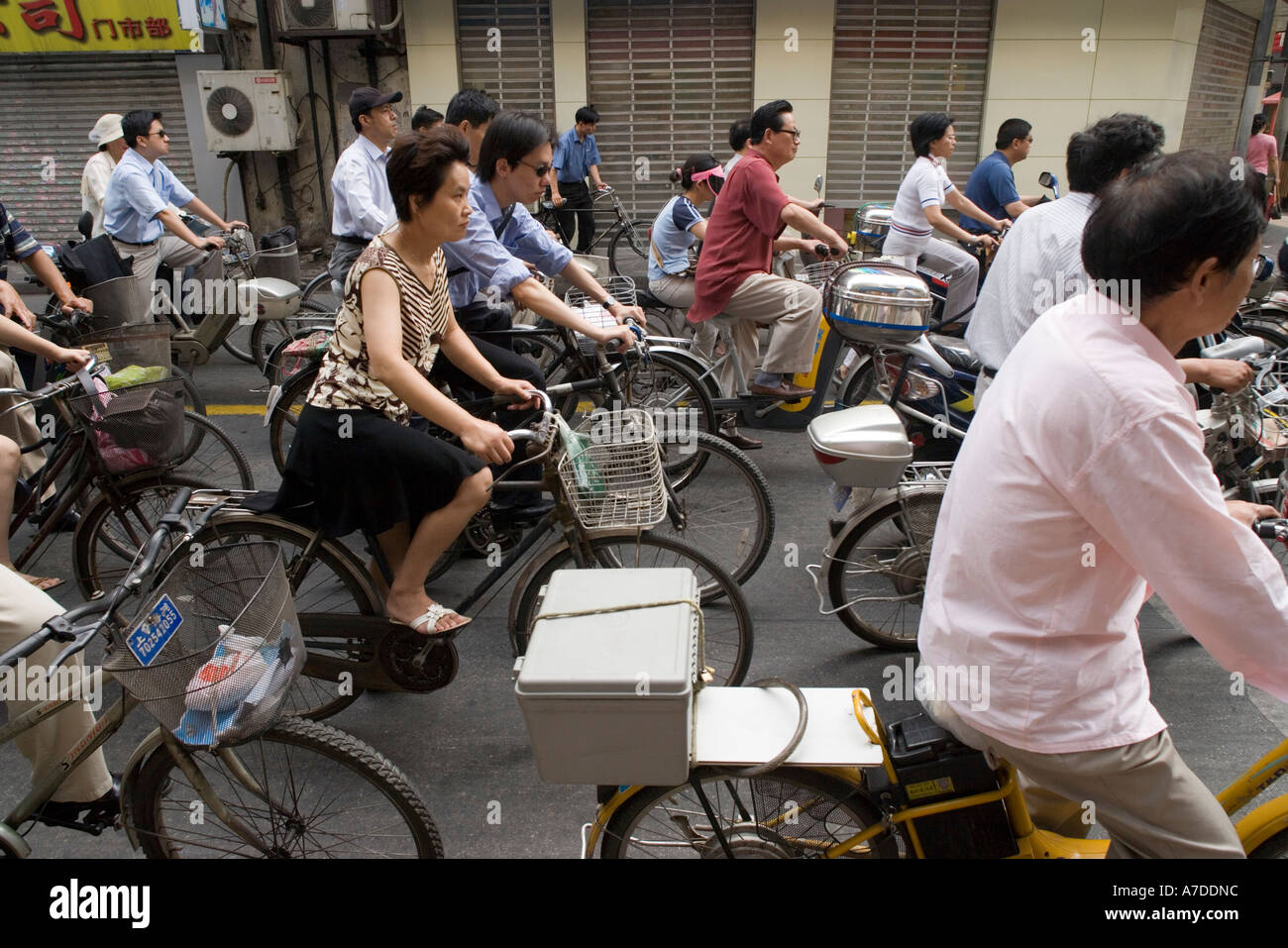 Asia China Shanghai Crowd of bicyclists and motor scooters fill streets ...