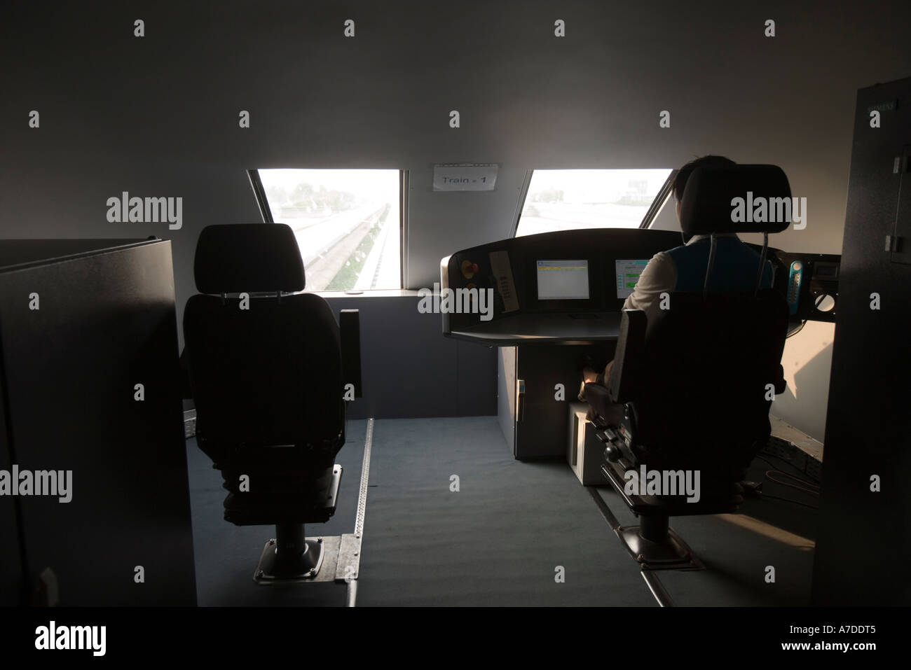 Asia China Shanghai One woman surpervises automated cabin of MagLev ...