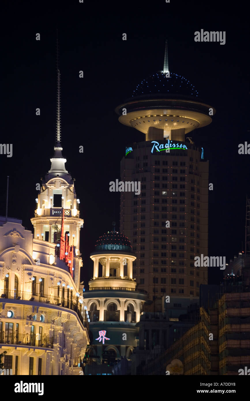 Asia China Shanghai The Radisson Hotel rises above neon lit shopping ...