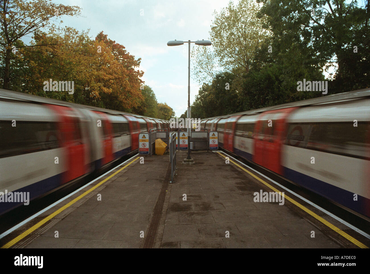 Two tube trains simultaneously entering and leaving a london ...
