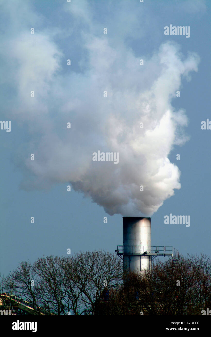 factory chimney releasing steam Stock Photo - Alamy