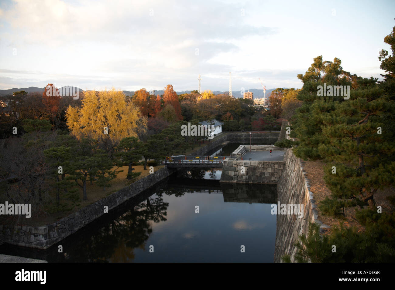 Stone walls and moat of Nijo Castle Nijo jo in evening sunlight city of ...