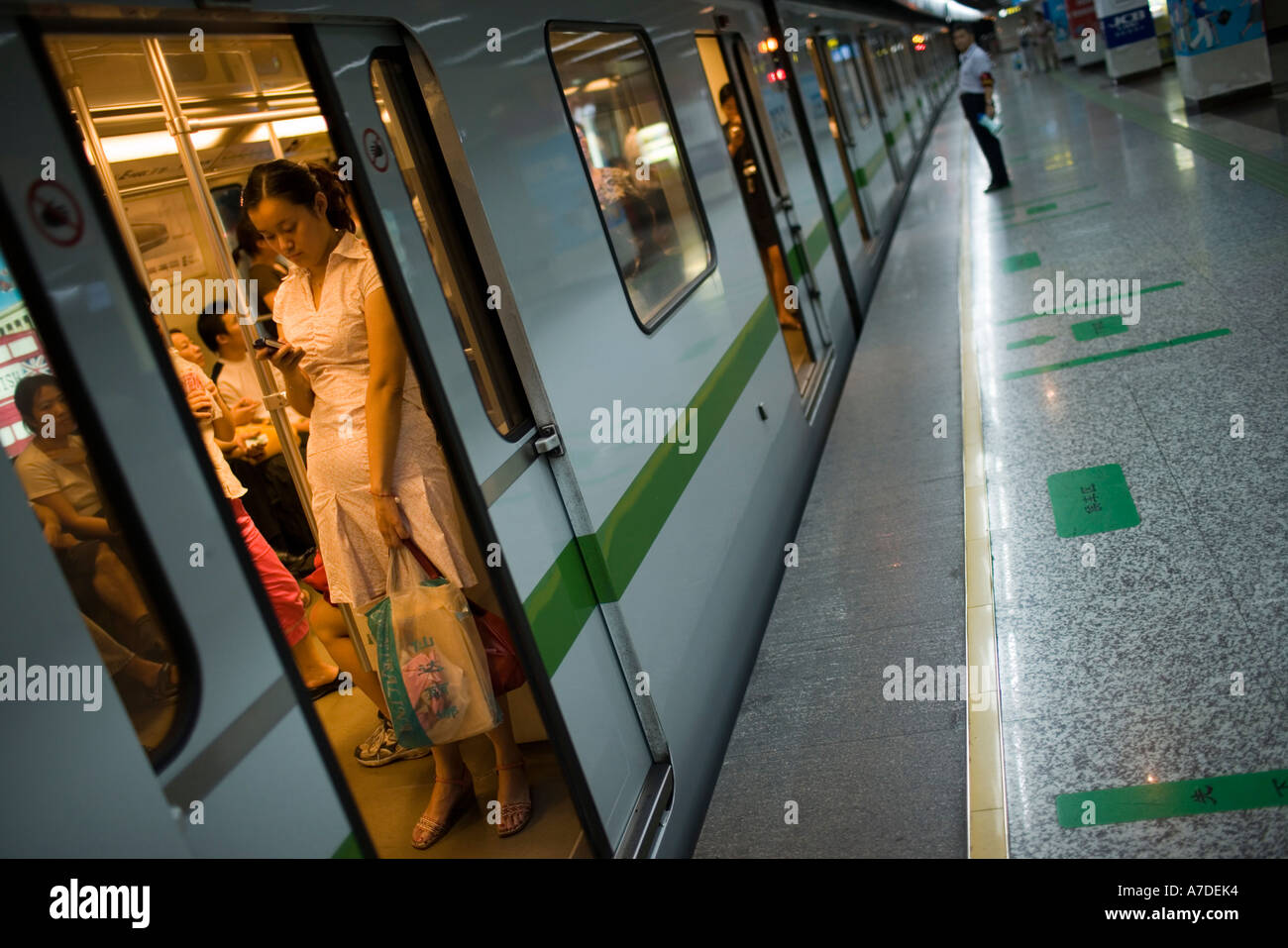 Asia China Shanghai Passengers on crowded Metro subway train during ...