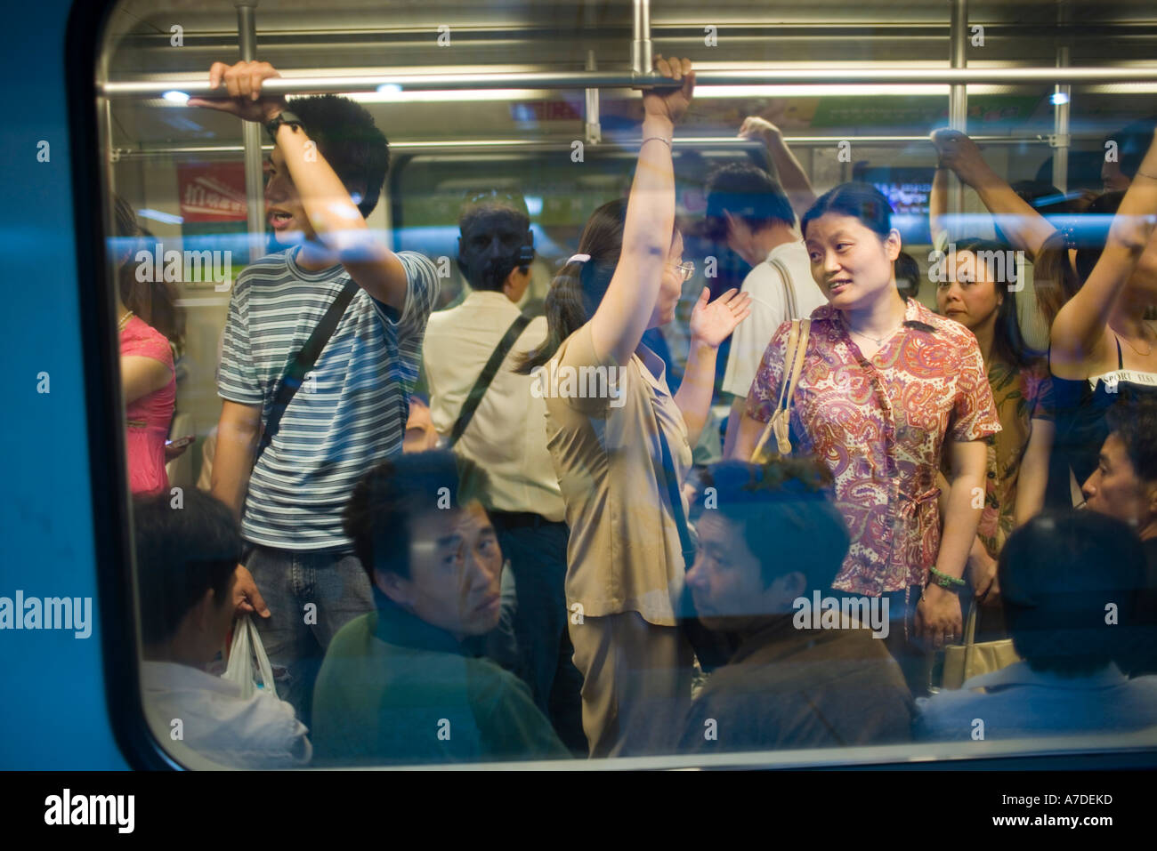 Asia China Shanghai Passengers on crowded Metro subway train during ...