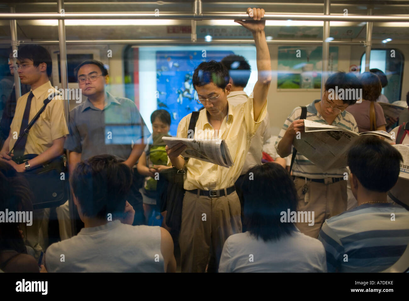 Asia China Shanghai Passengers on crowded Metro subway train during ...