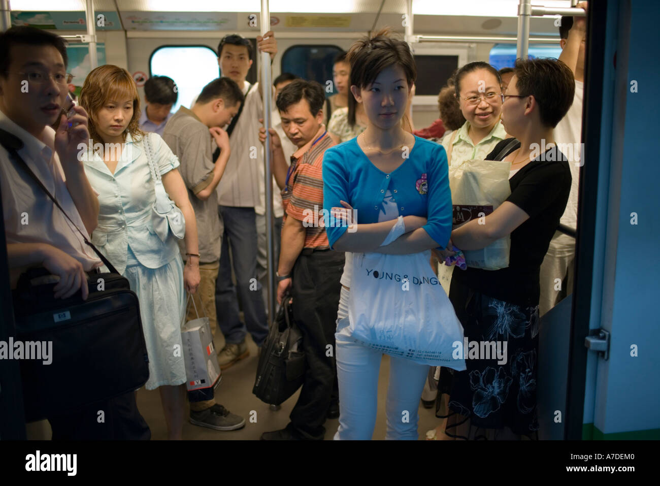 Asia China Shanghai Passengers on crowded Metro subway train during ...