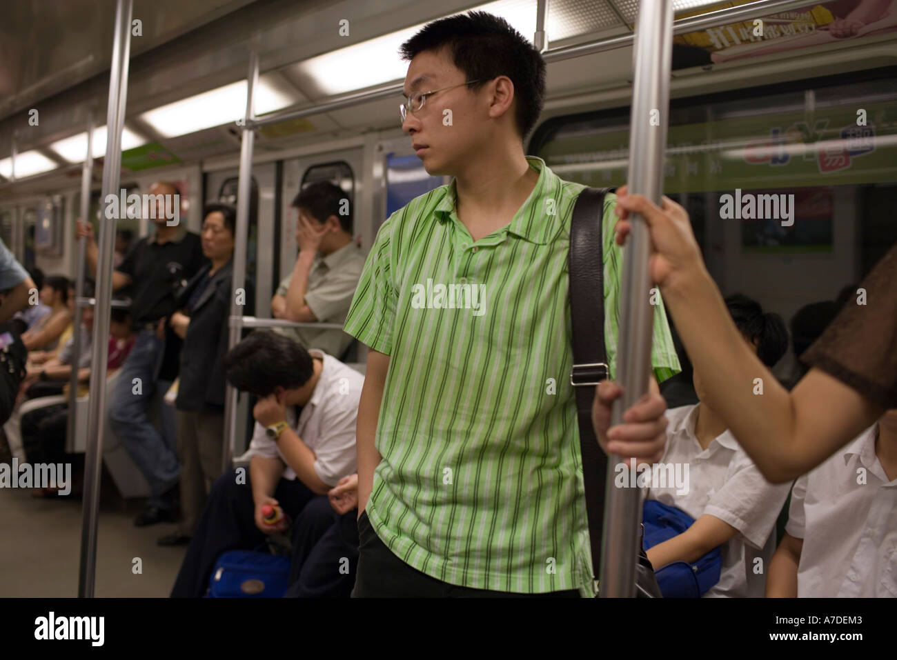 Asia China Shanghai Passengers on crowded Metro subway train during ...
