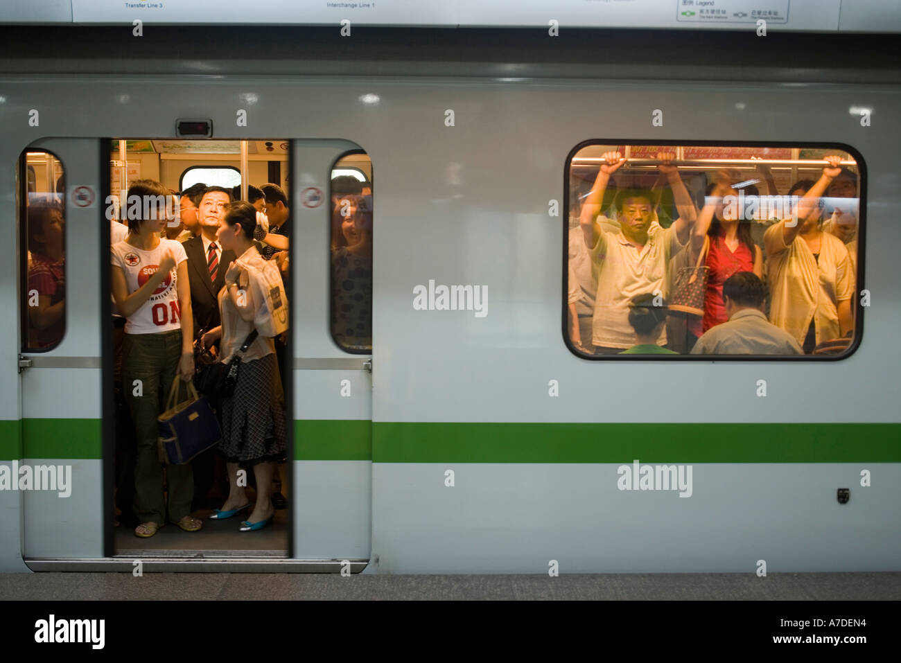 Asia China Shanghai Passengers on crowded Metro subway train during ...