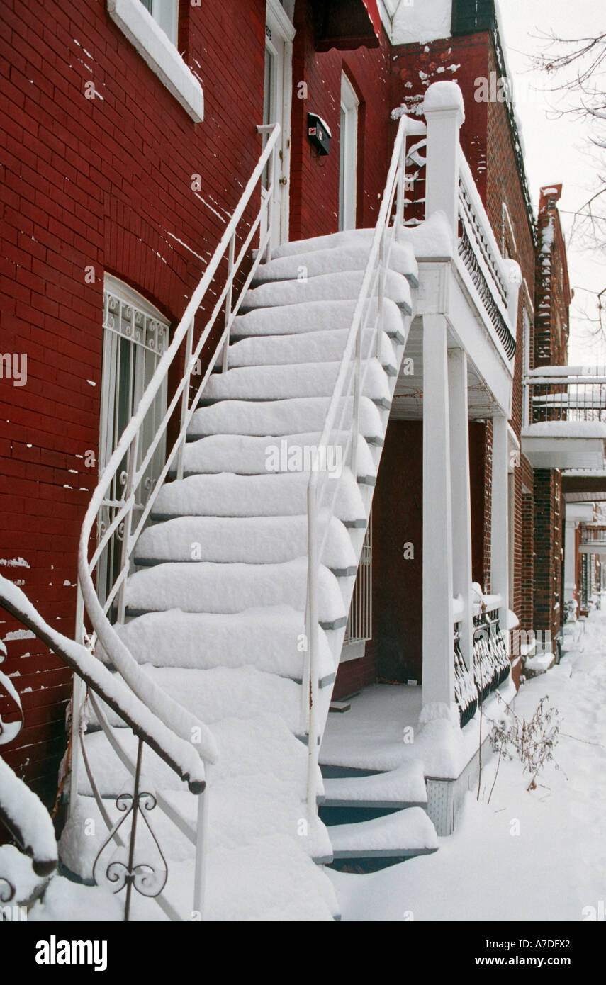 A typical street scene of external stairs covered in fresh snow in ...