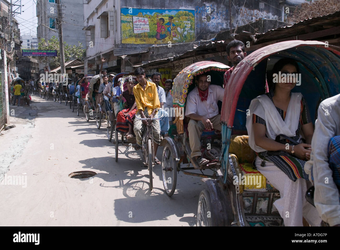 Rickshaw pullers stuck in traffic in Dhaka Bangladesh Stock Photo - Alamy