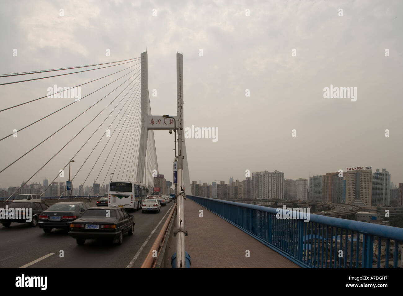 Asia China Shanghai Midday traffic on Nanpu Bridge across Huangpu River ...