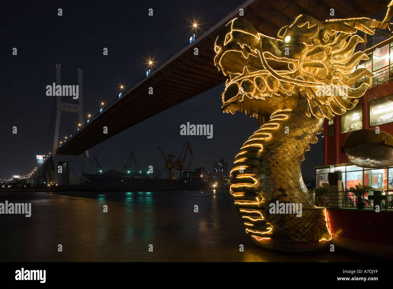 Asia China Shanghai Illuminated dragon outside floating Chinese ...