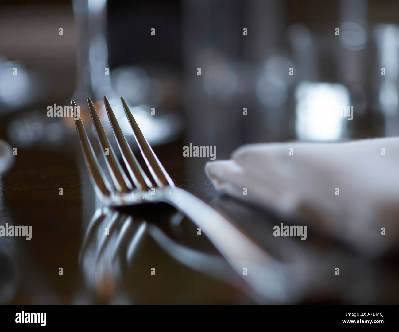 Fork on a table Stock Photo - Alamy