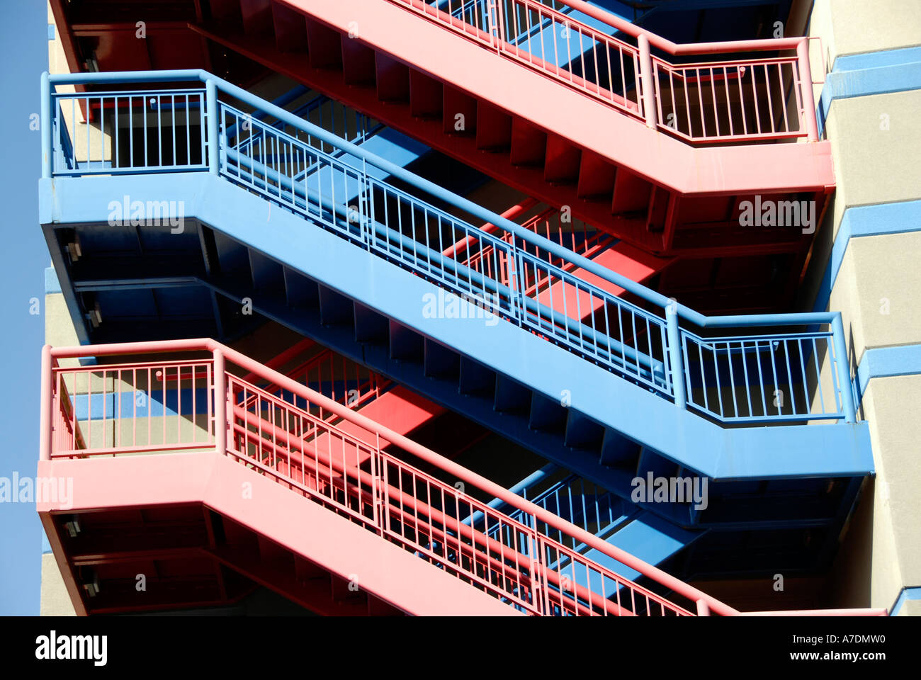 Pattern of colorful stairs on a exterior fire escape system Stock Photo ...