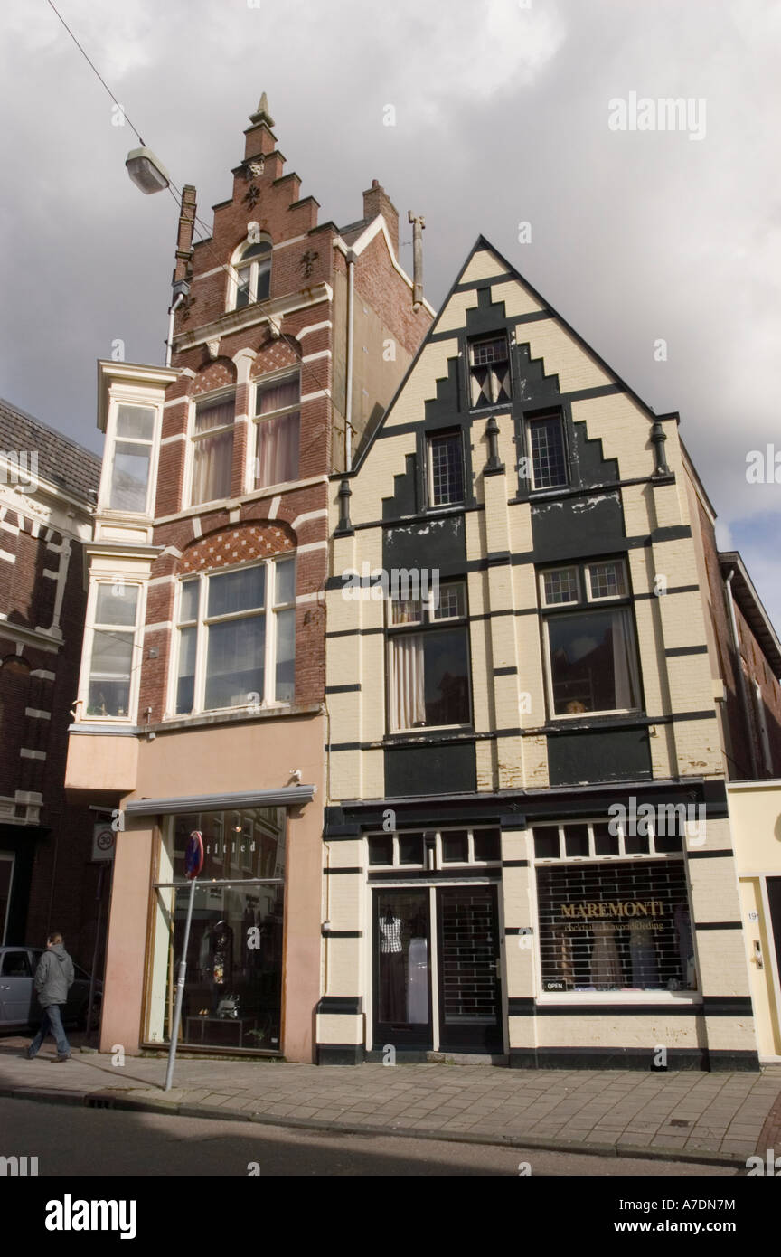 Old Dutch apartment buildings with shops incHaarlem North Holland Stock ...