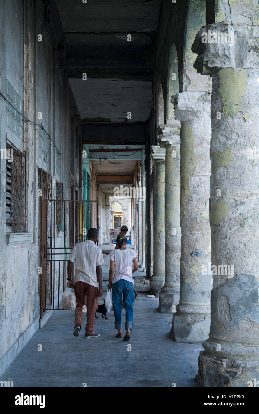 Cuban people walking in the streets Malecon Havana Cuba Stock Photo - Alamy