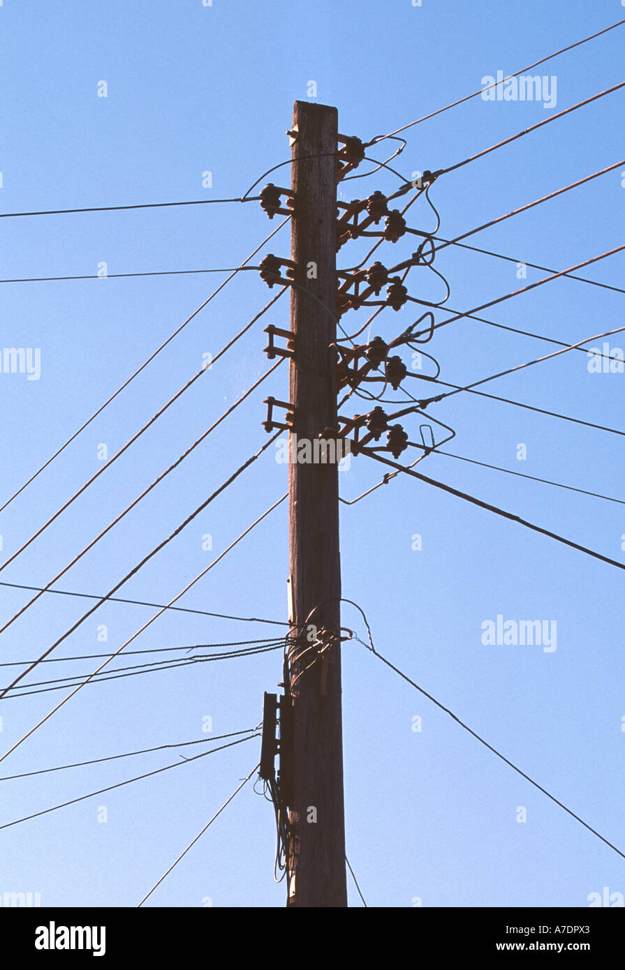 Telephone pole with array of wires arriving and leaving Scotland Stock ...