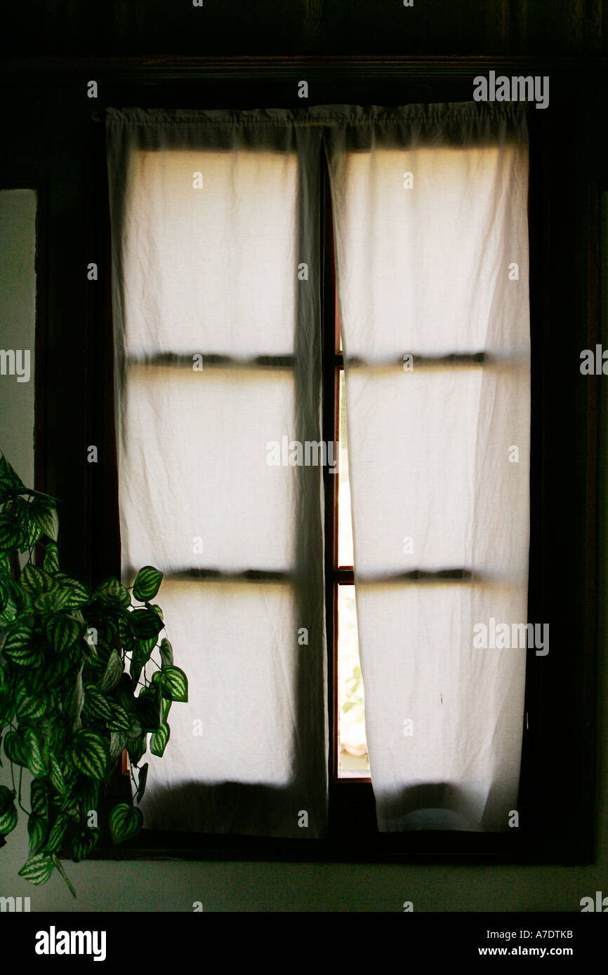 Typical Bulgarian home wooden window windows wall moan brick bricks ...