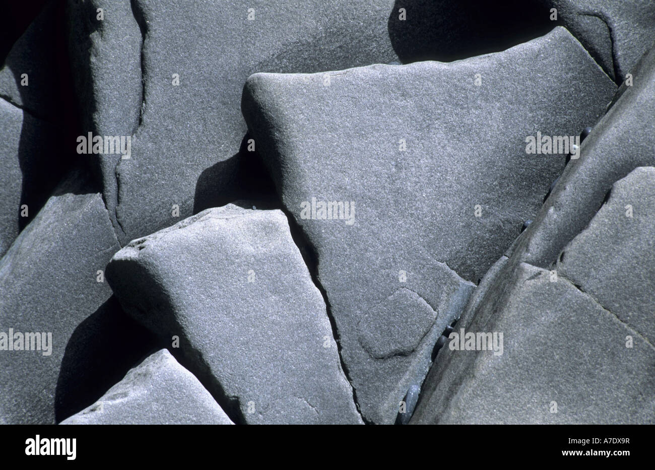 Sandy beach with basalt stones hi-res stock photography and images - Alamy
