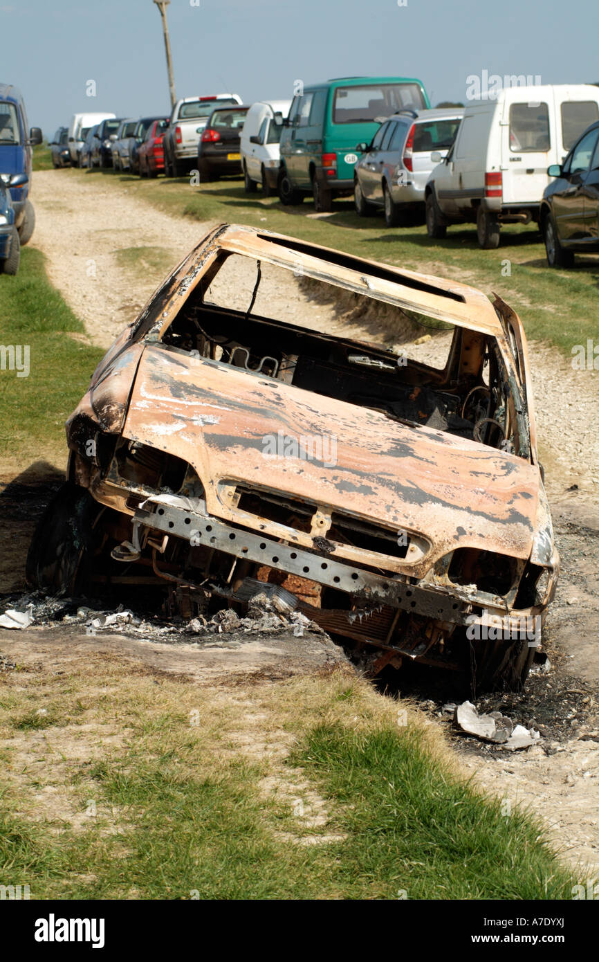 Fire damaged car. Burnt out Stock Photo - Alamy