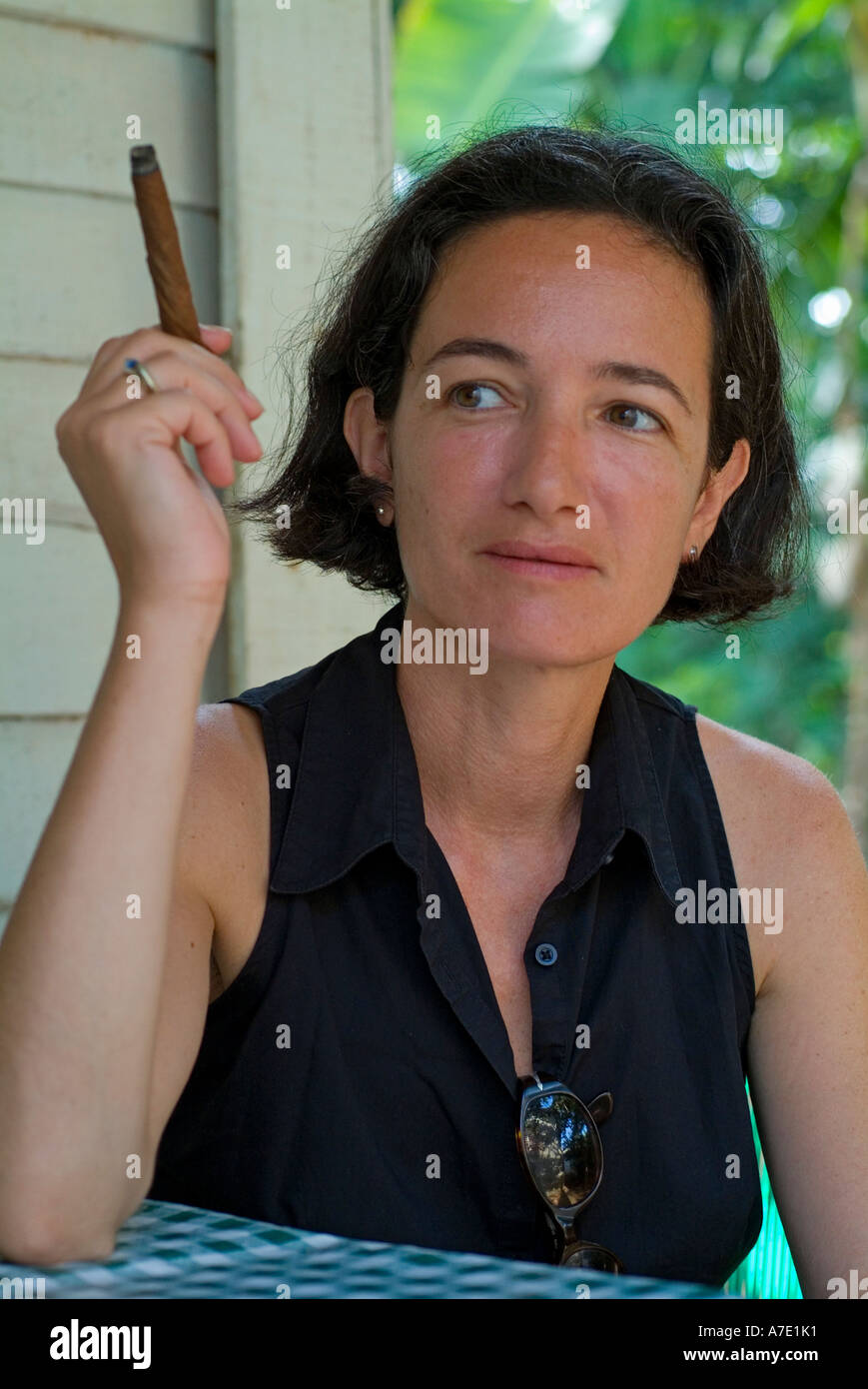Old woman smoking a cuban cigar hi-res stock photography and images - Alamy