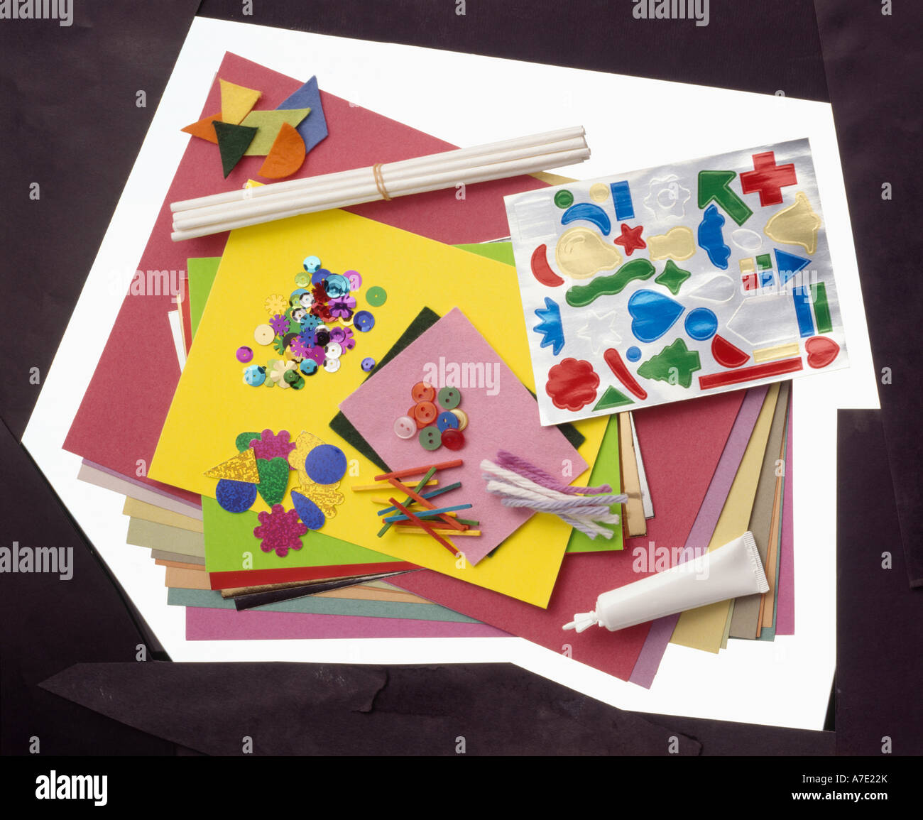 Close-up of colourful paper and stickon shapes for cards Stock Photo ...