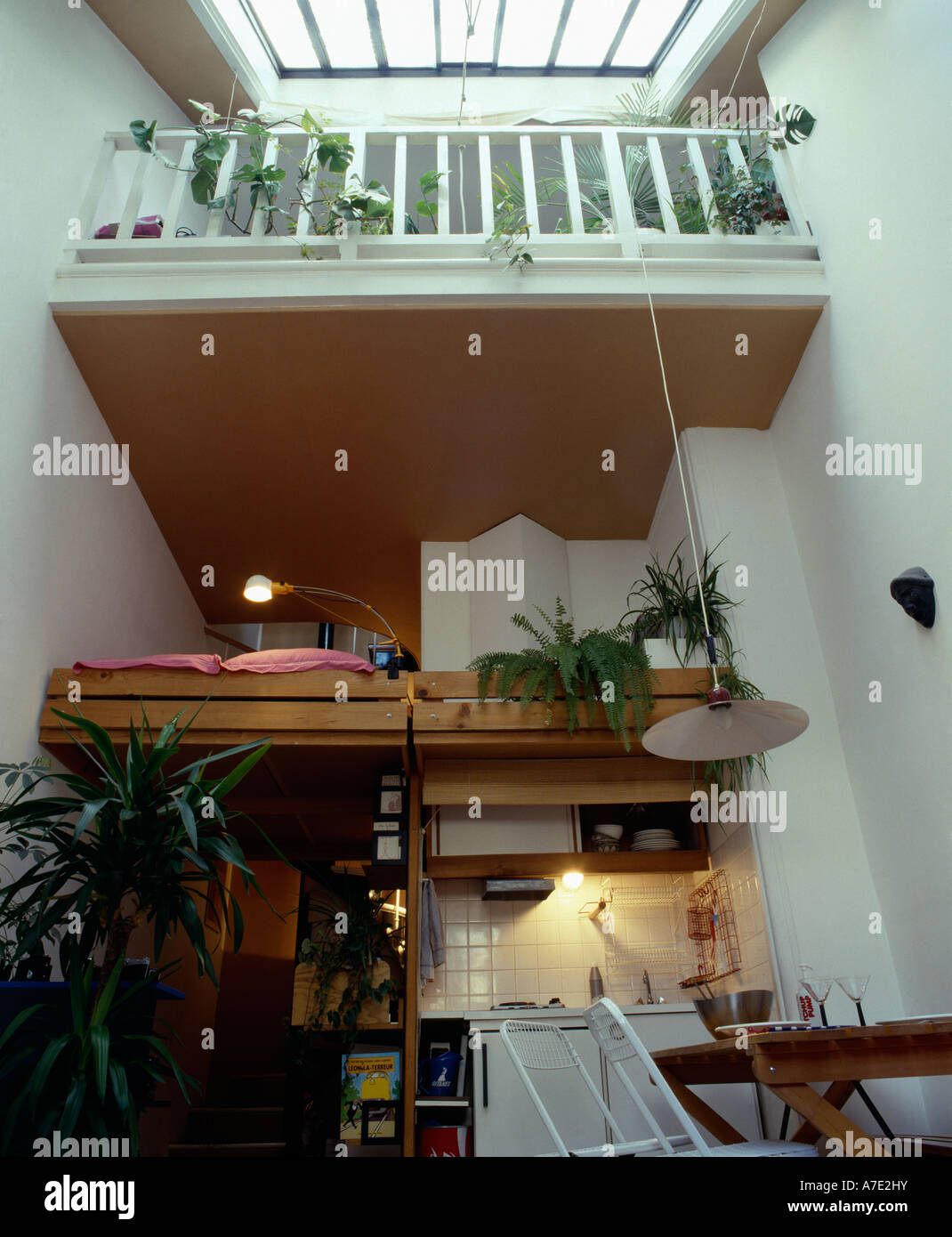 Sleeping platform in vertical one room living space Stock Photo - Alamy