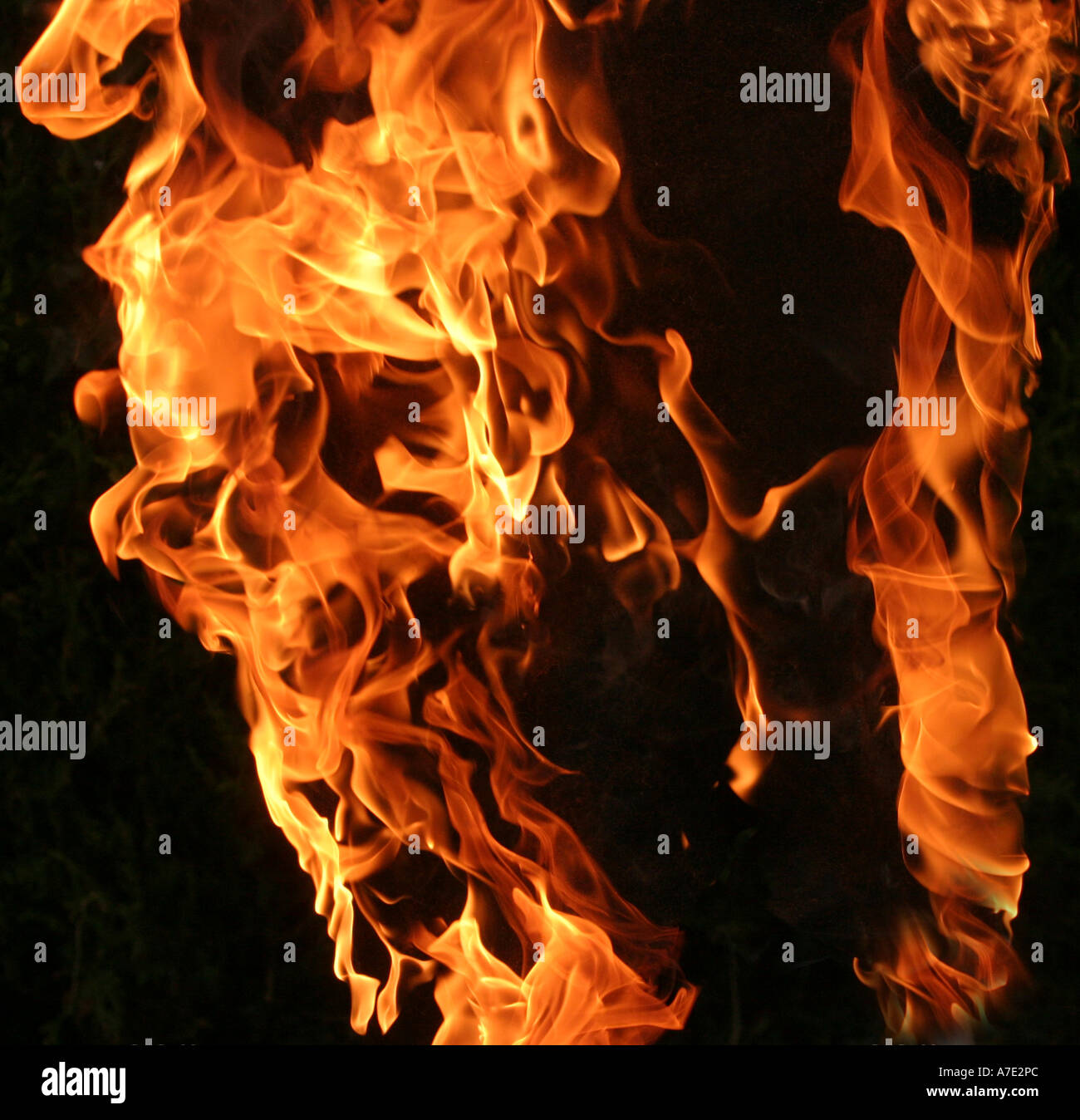 Orange flames against black background hi-res stock photography and ...